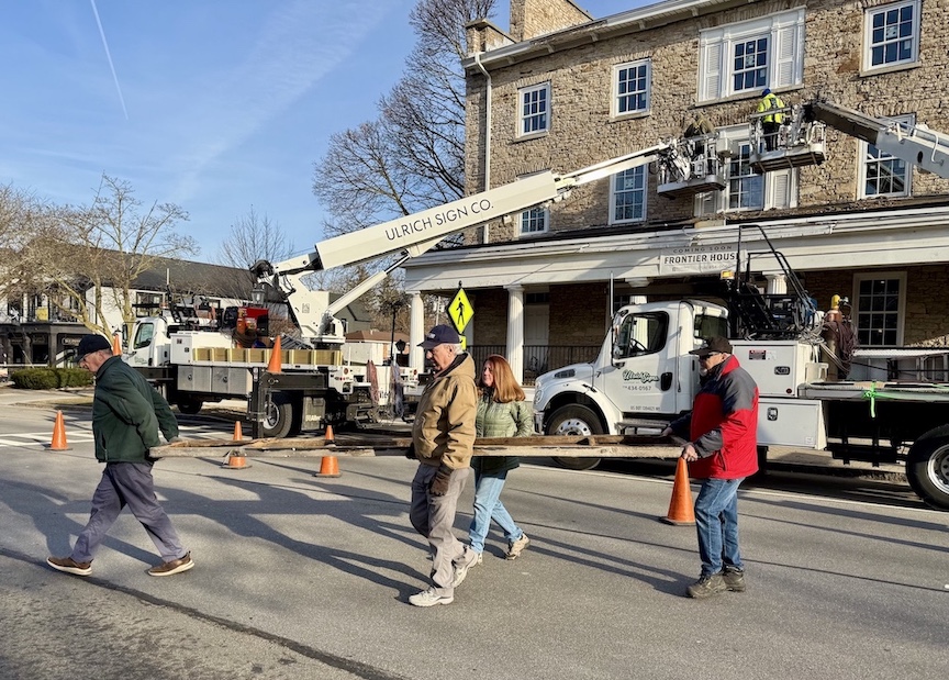 PHOTOS + VIDEO: Watch the Frontier House get a new sign
