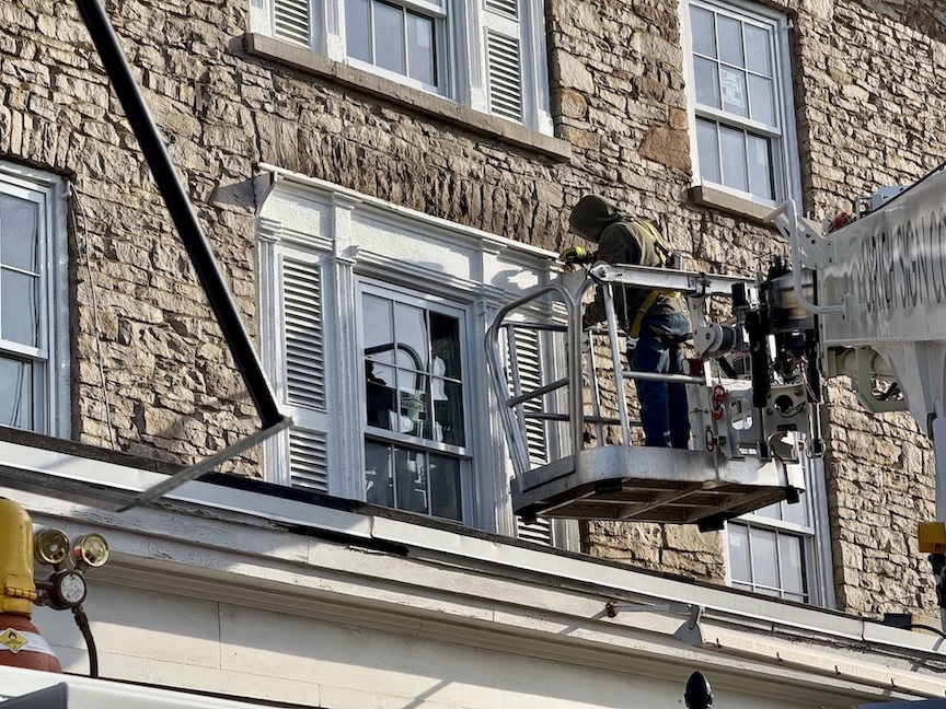 PHOTOS + VIDEO: Watch the Frontier House get a new sign