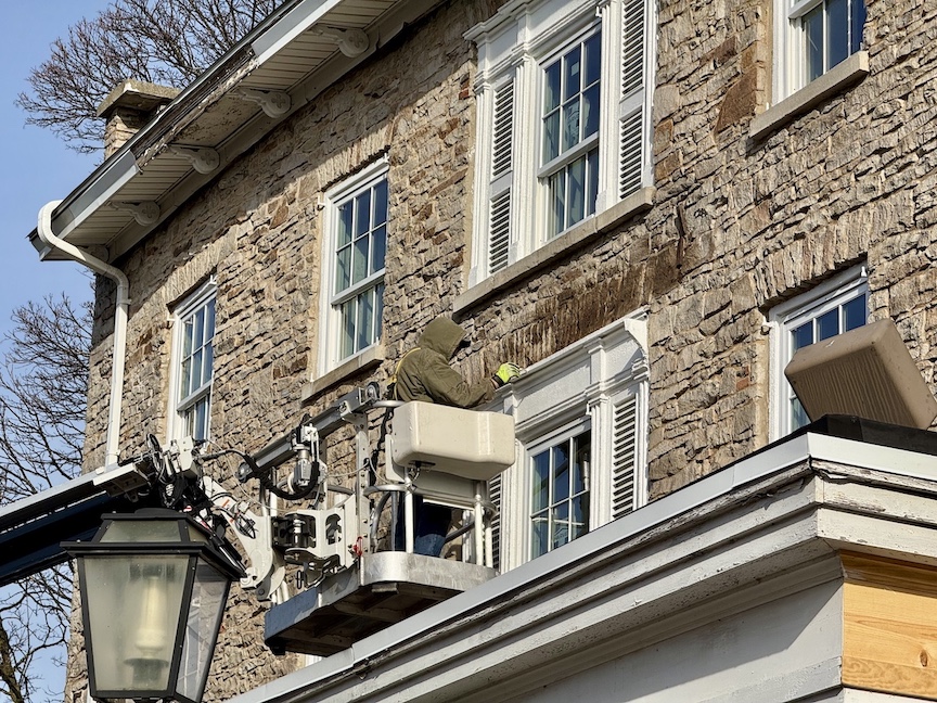 PHOTOS + VIDEO: Watch the Frontier House get a new sign