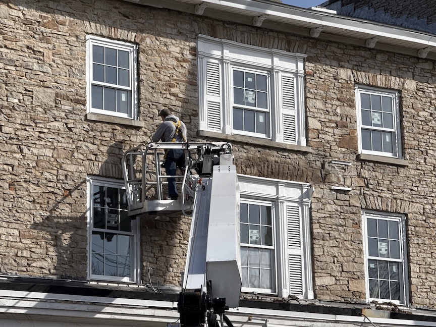 PHOTOS + VIDEO: Watch the Frontier House get a new sign