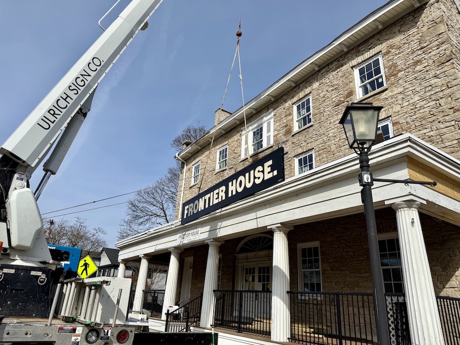 PHOTOS + VIDEO: Watch the Frontier House get a new sign