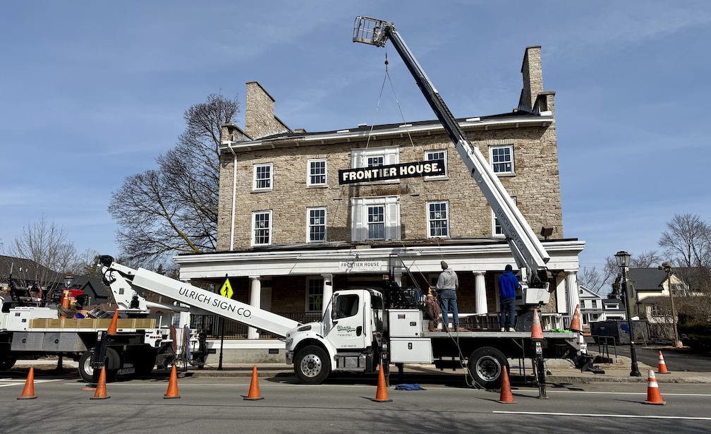 PHOTOS + VIDEO: Watch the Frontier House get a new sign