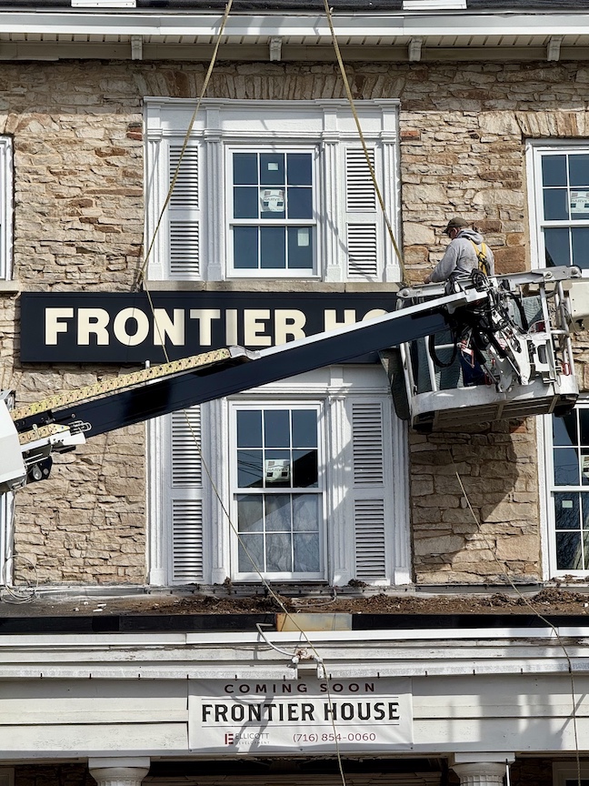 PHOTOS + VIDEO: Watch the Frontier House get a new sign