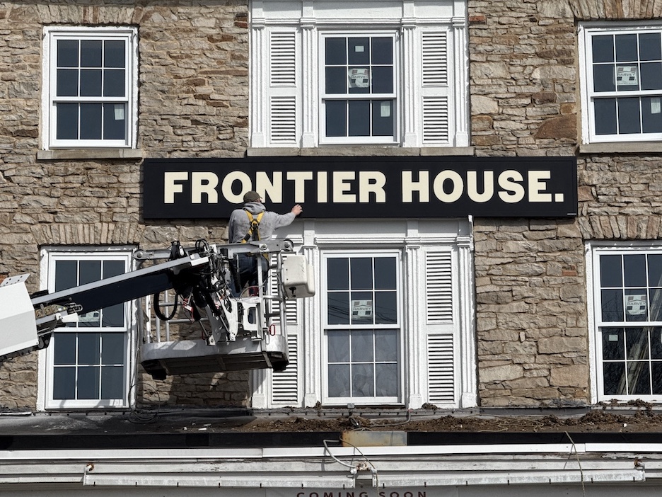 PHOTOS + VIDEO: Watch the Frontier House get a new sign