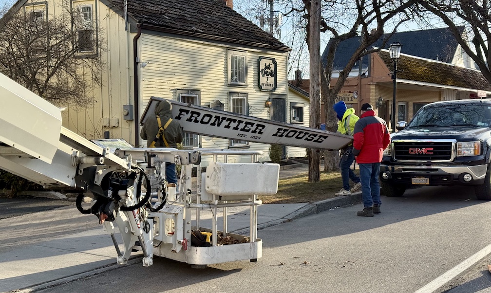 PHOTOS + VIDEO: Watch the Frontier House get a new sign