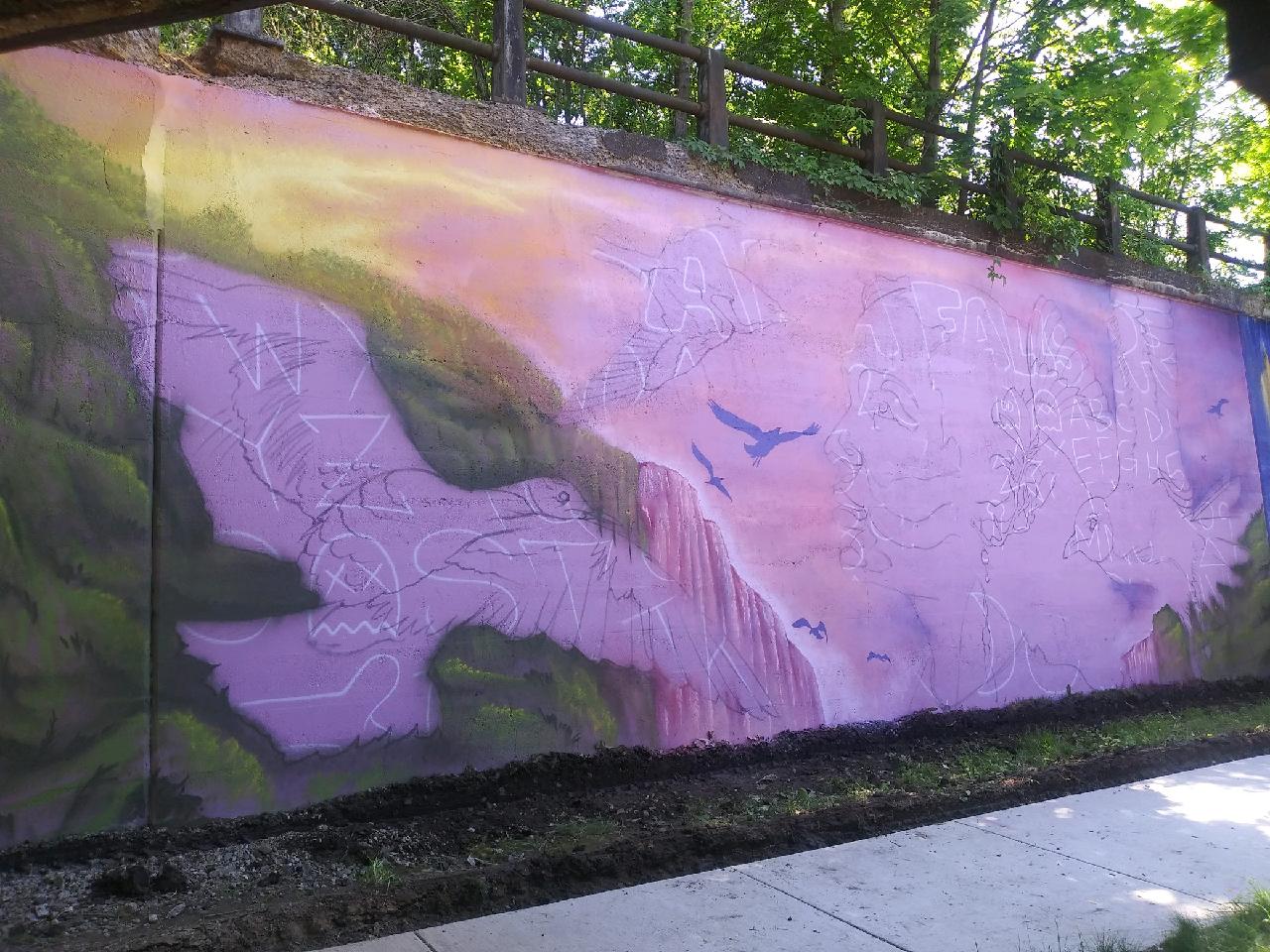 Artist Justin Suarez begins work on Depot Avenue mural